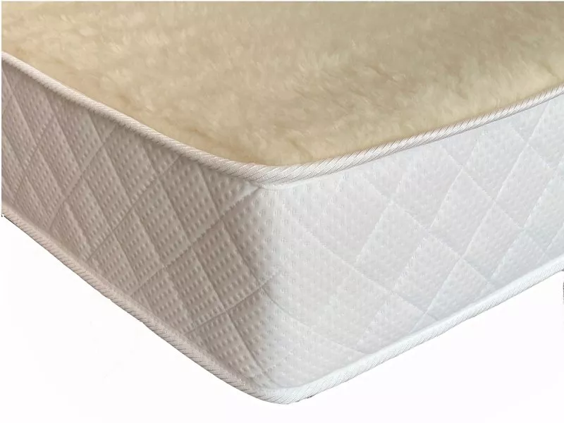 Luxcell Orthopaedic mattress with integrated Merino wool topper